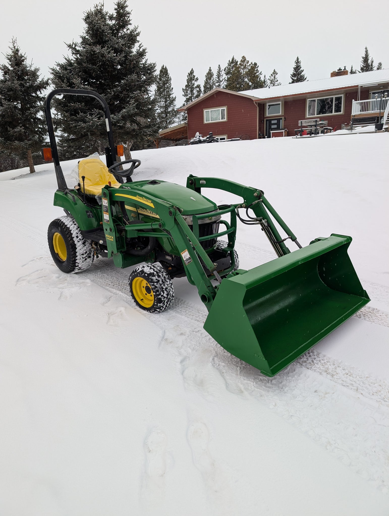 John Deere 2305 with CX200 Loader and bucket – Hoogenboom Greenhouses ...